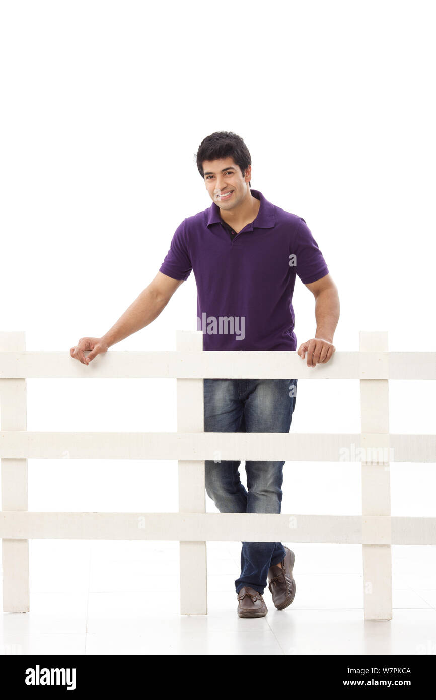 Man Leaning Against Railing High Resolution Stock Photography and ...