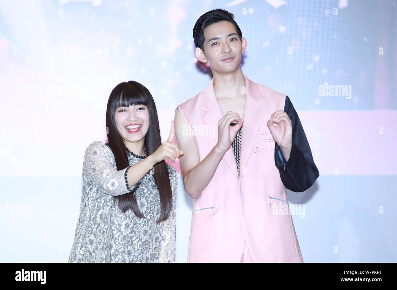 Japanese singer and actress Miwa, left, and actor Ryo Ryusei attend a ...