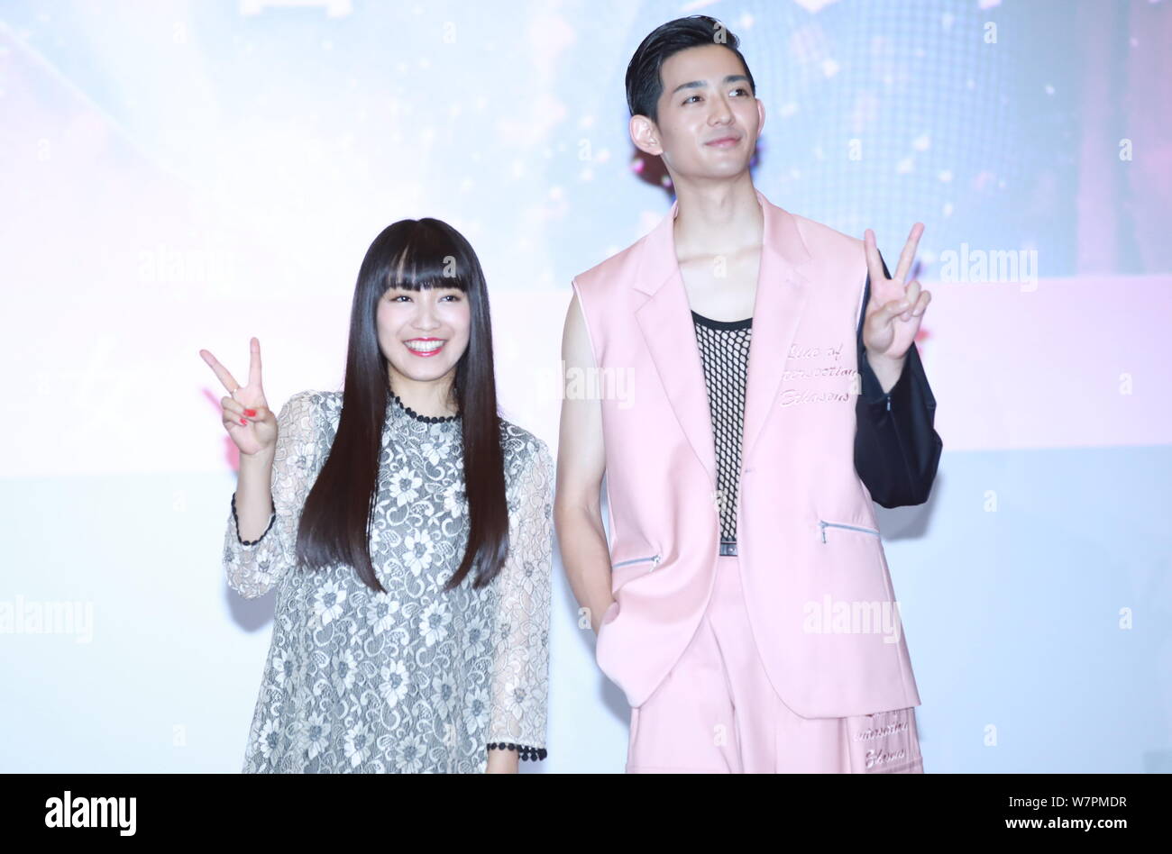 Japanese singer and actress Miwa, left, and actor Ryo Ryusei attend a ...