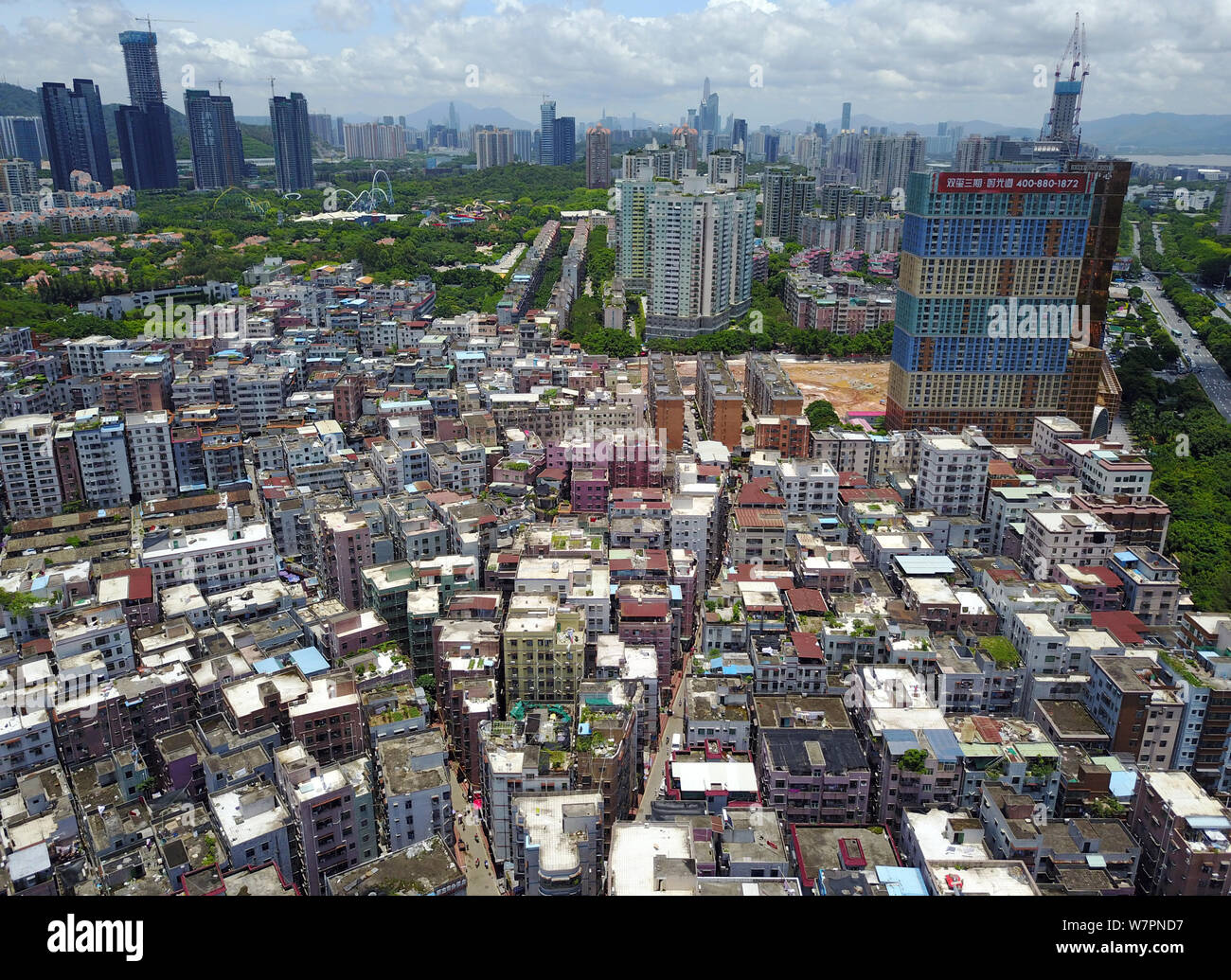 Aerial view of old residential houses and buildings in Baishizhou urban ...