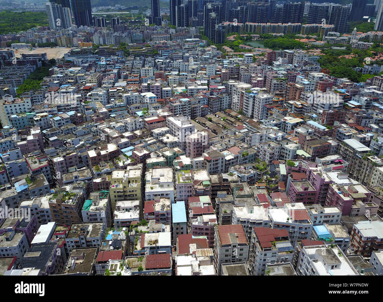 Aerial view of old residential houses and buildings in Baishizhou urban ...