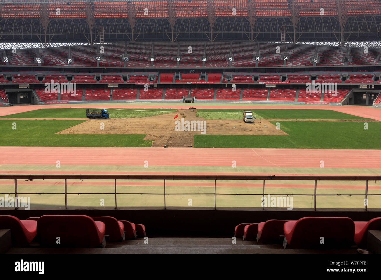View of the football pitch being repaired at a sports stadium after it ...