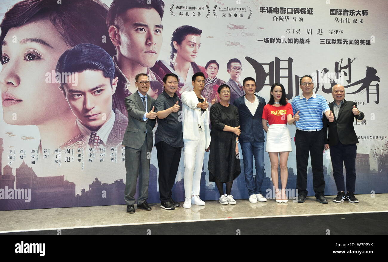 Taiwanese actors Wallace Huo, fourth right, and Eddie Peng, third left ...