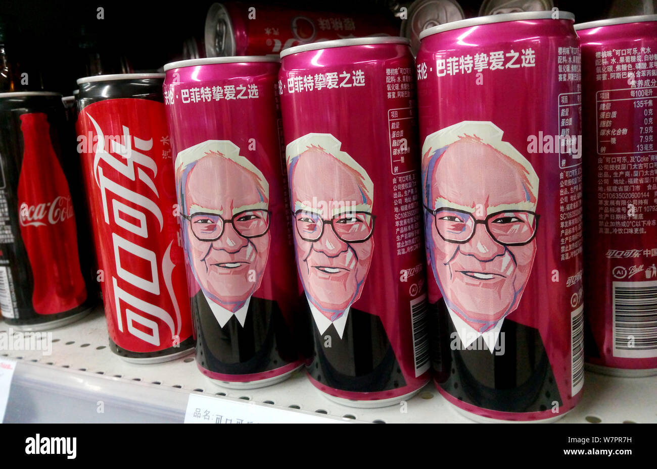 Cans of Cherry Coca-Cola with a portrait of Warren Buffett, Chairman ...