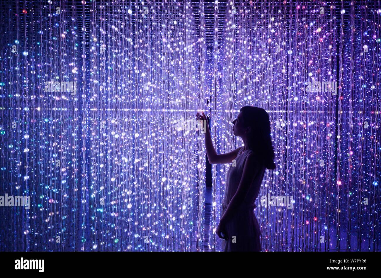 A Chinese citizen visits the immersive exhibition "teamLab: Dance! Art ...
