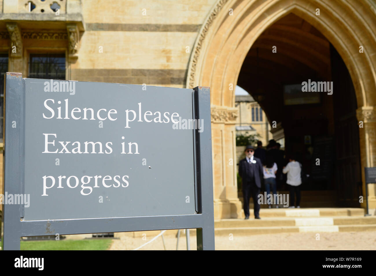 England, Oxford, Christ Church entrance with 'silence please' sign ...