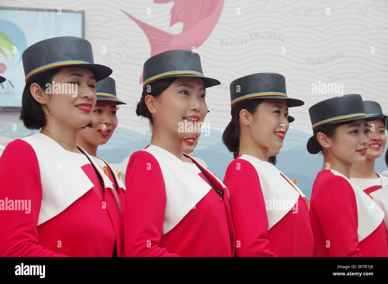 Japanese hostesses pose at the Japan Pavilion in the World Expo Park ...