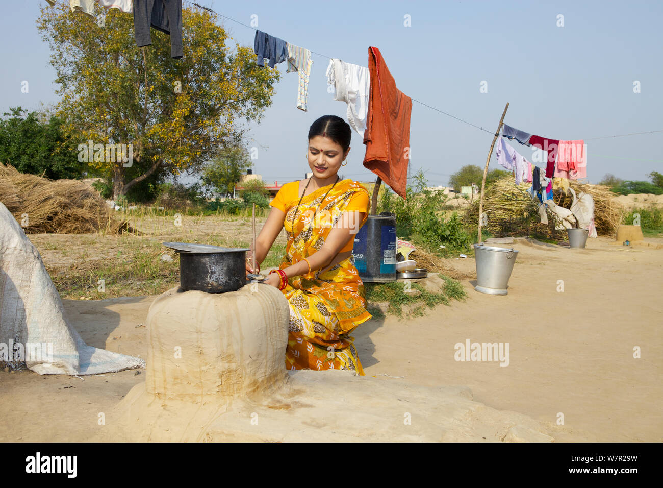 Rural woman preparing food Stock Photo - Alamy