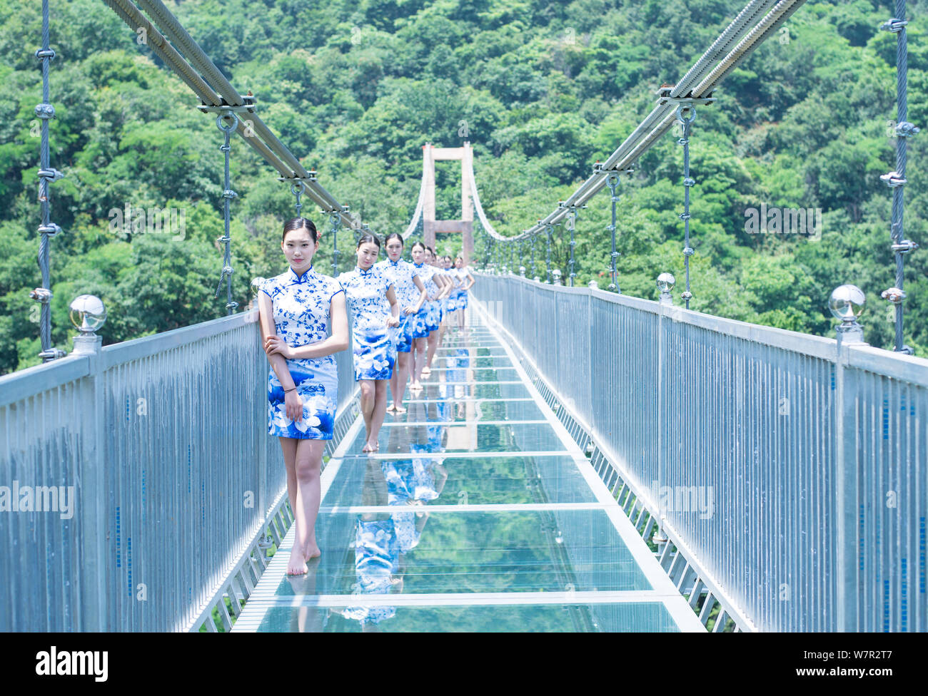 Female graduates dressed in cheongsam, also known as qipao in Chinese ...