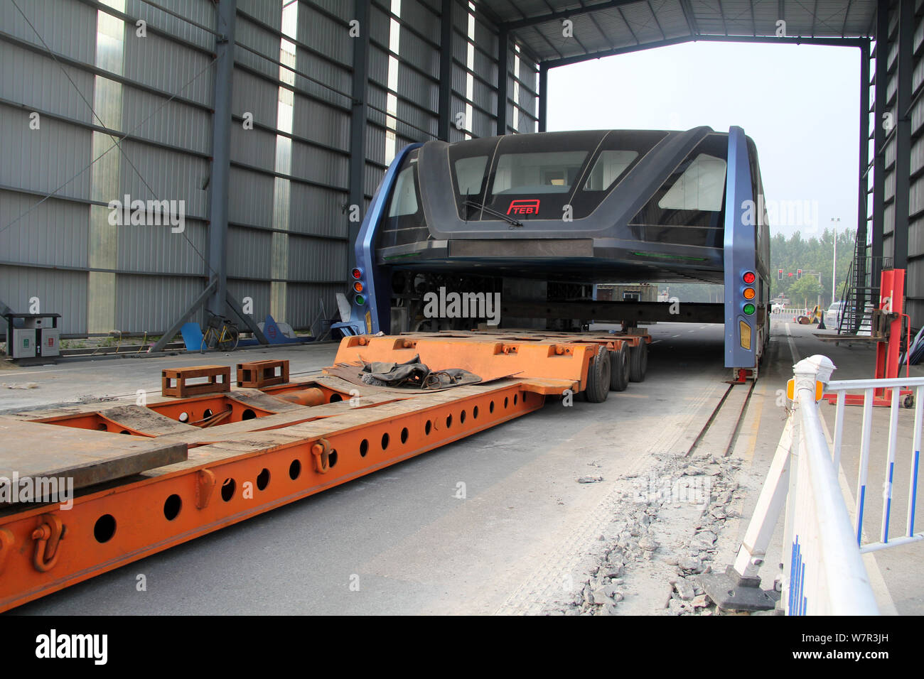 The Transit Elevated Bus (TEB) is to be tugged by a trailer from the ...