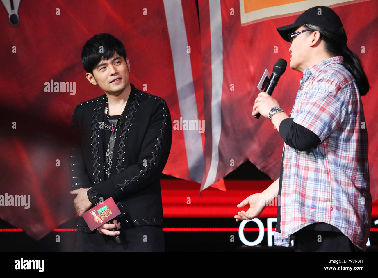 Taiwanese singer Jay Chou, left, attends a press conference for Season ...