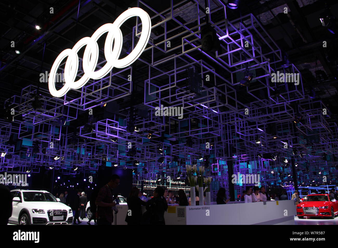 --FILE--People visit the stand of Audi during the 17th Shanghai ...