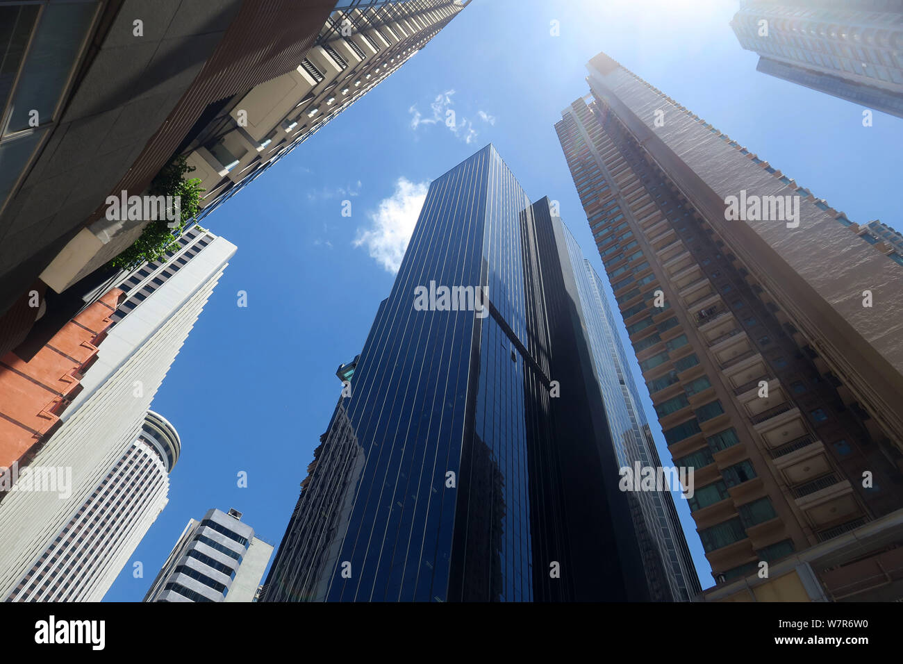 A worm's eye view of high-rise buildings and skyscrapers in Hong Kong ...