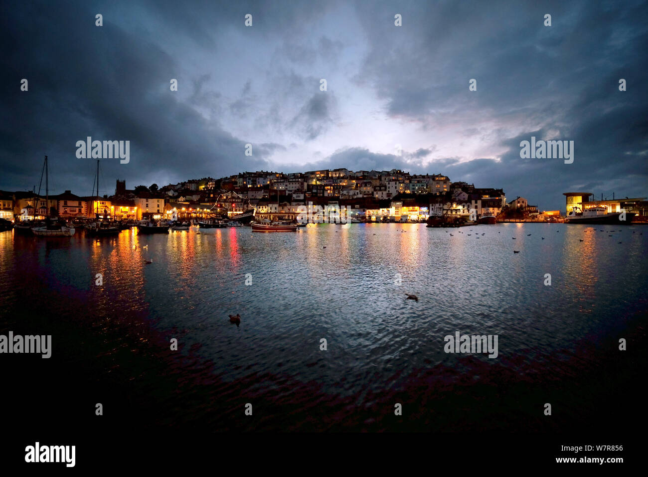 Brixham Harbour, a seaside town in Devon at Dusk and at High Tide Stock ...