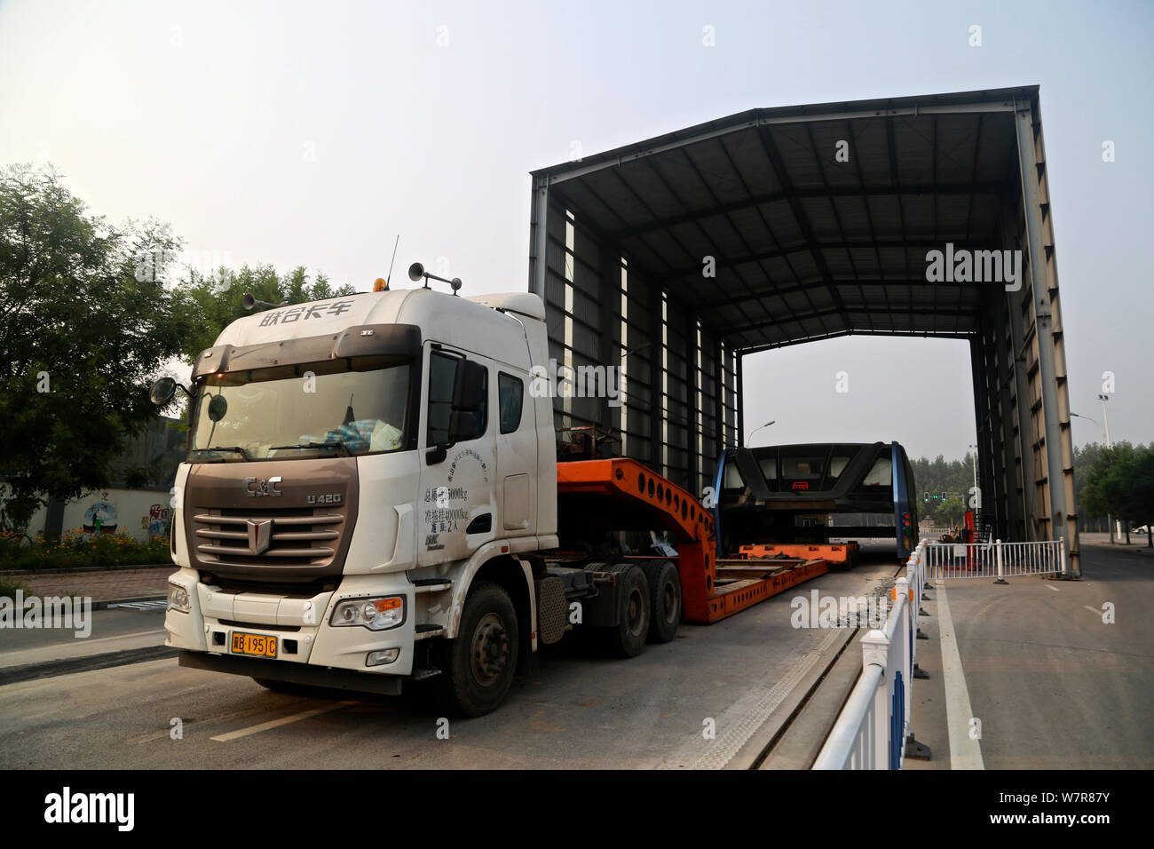The Transit Elevated Bus (TEB) is to be tugged by a trailer from the ...