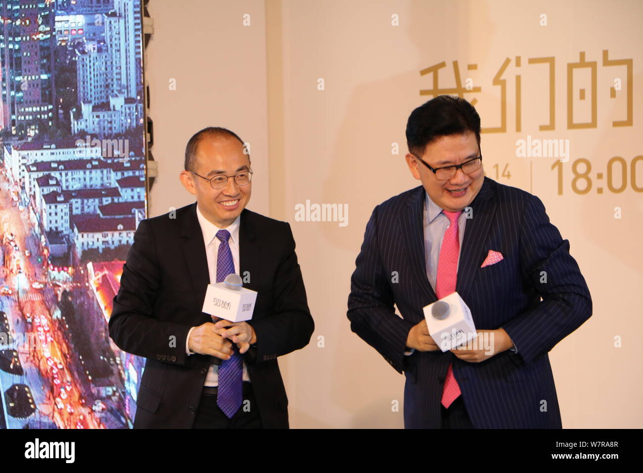 Pan Shiyi, left, co-founder, Chairman and co-CEO of SOHO China, attends ...