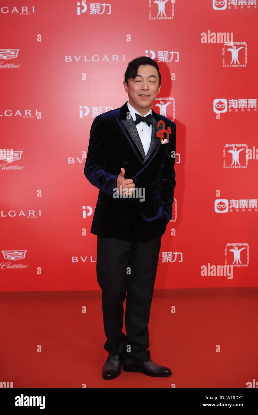 Chinese actor Huang Bo arrives on the red carpet for the closing ...