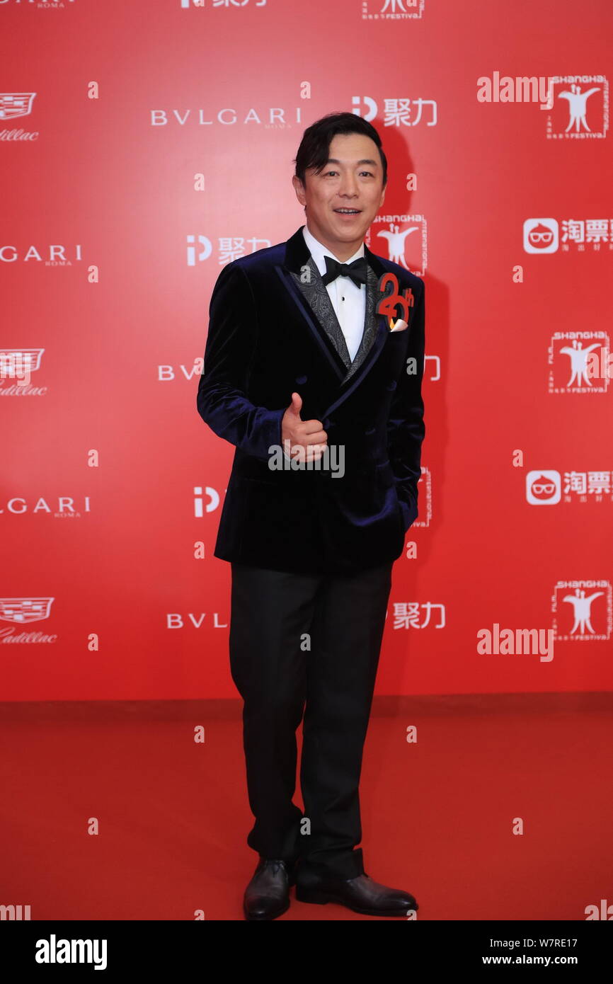 Chinese actor Huang Bo arrives on the red carpet for the closing ...