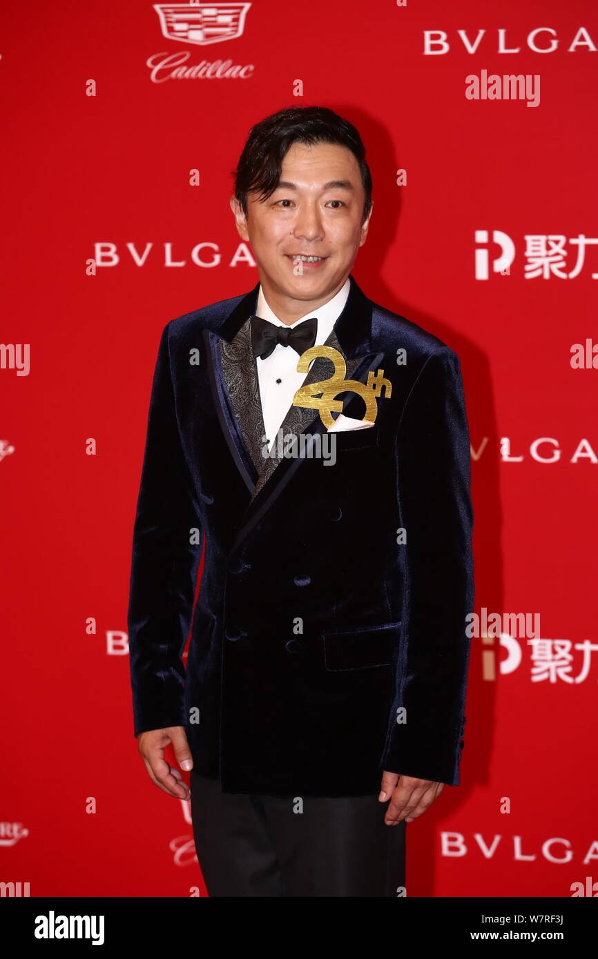 Chinese actor Huang Bo arrives on the red carpet for the closing ...