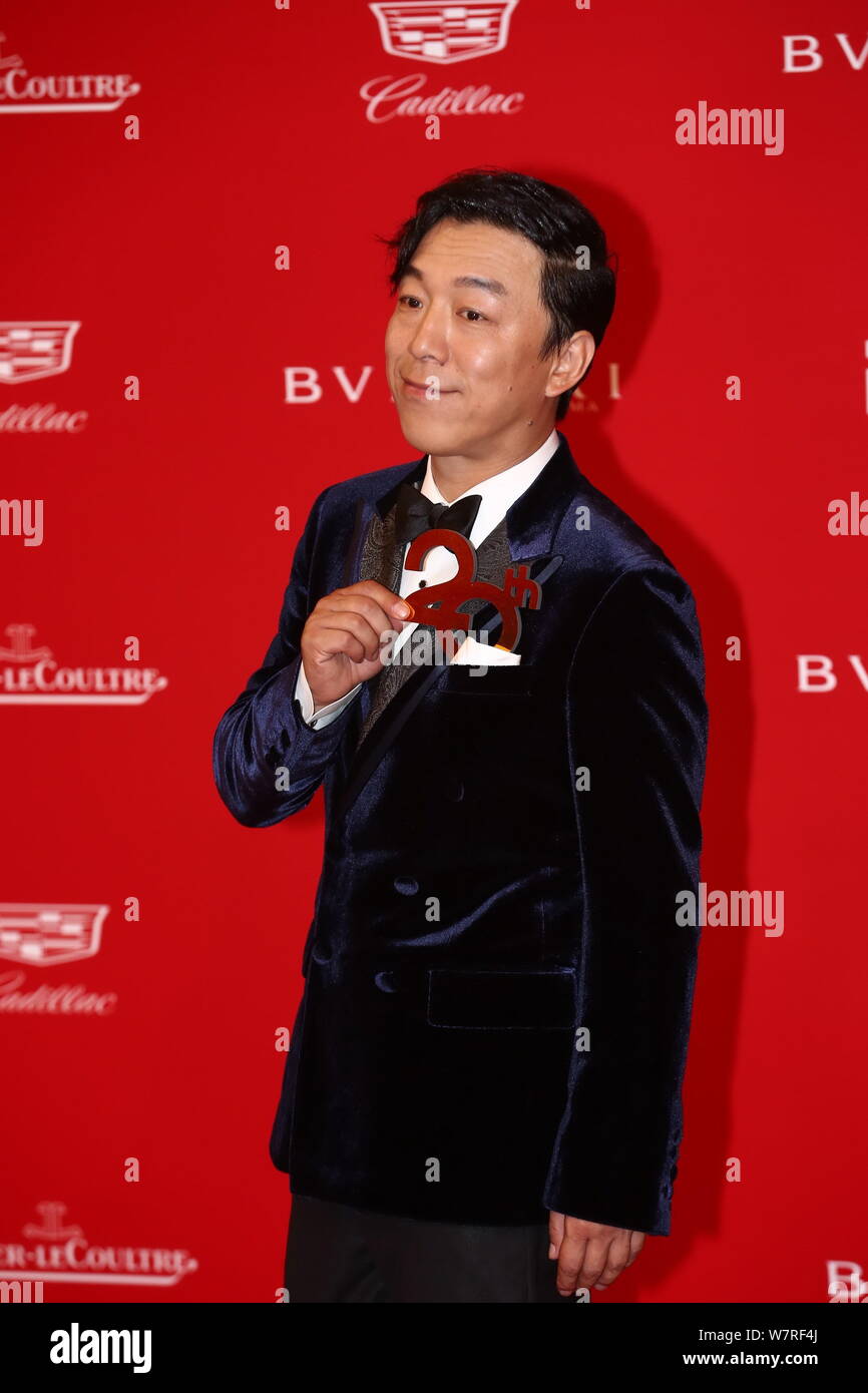 Chinese actor Huang Bo arrives on the red carpet for the closing ...