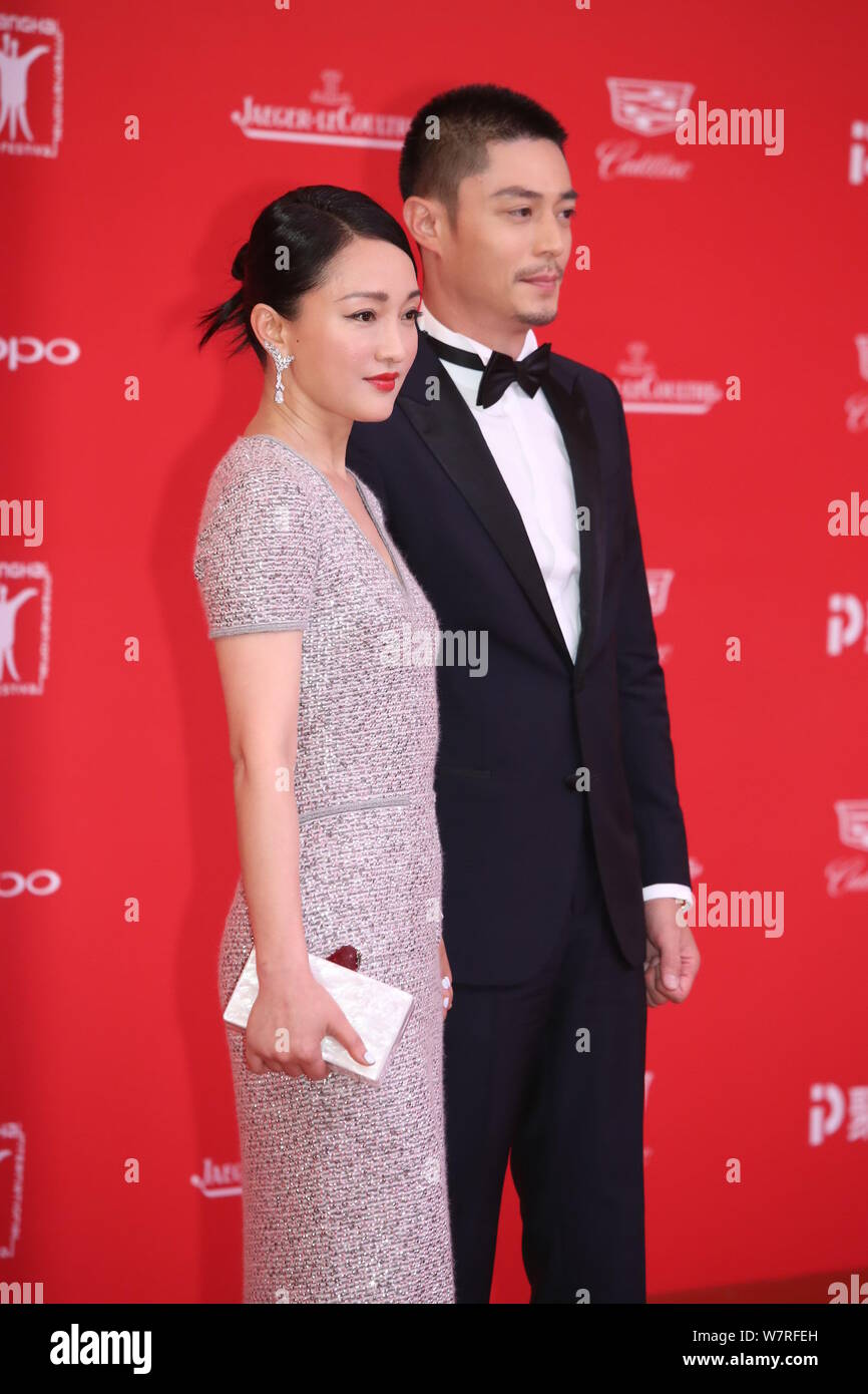 Chinese actress Zhou Xun, left, and Taiwanese actor Wallace Huo arrive ...