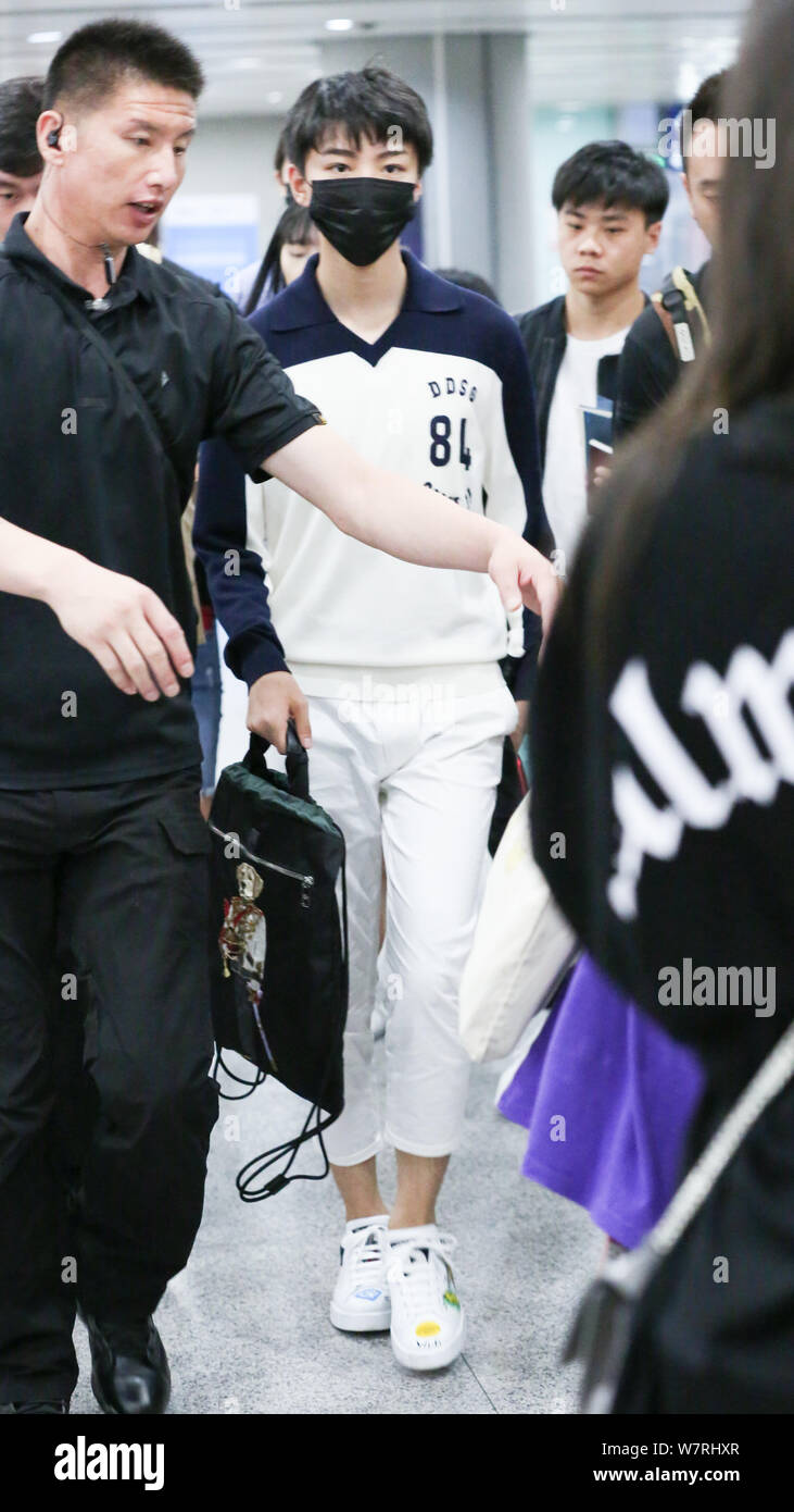 Karry Wang or Wang Junkai, center, of Chinese boy group TFBoys, is ...