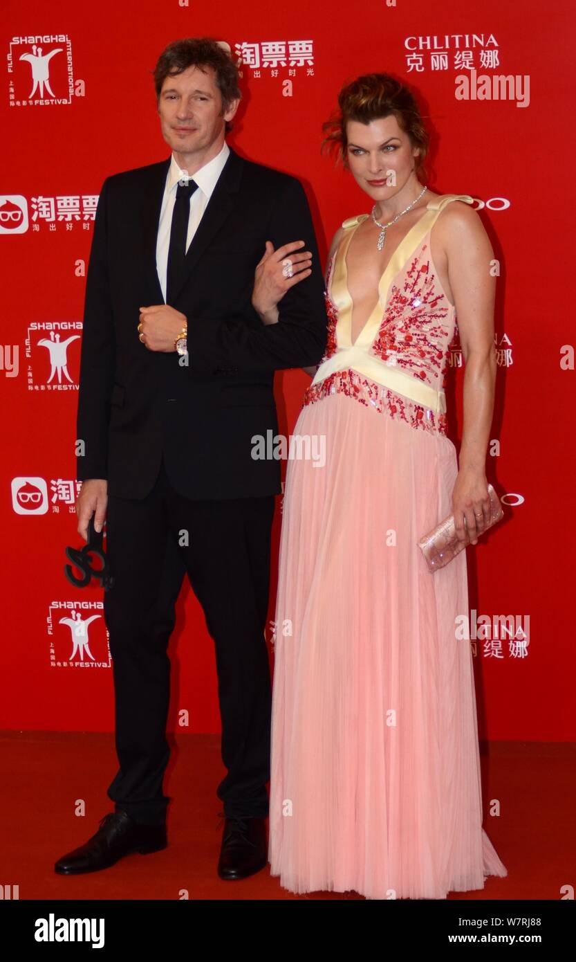 American actress Milla Jovovich, right, and her English film director ...
