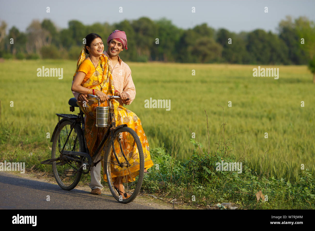 Couple riding bicycle india hi-res stock photography and images - Alamy