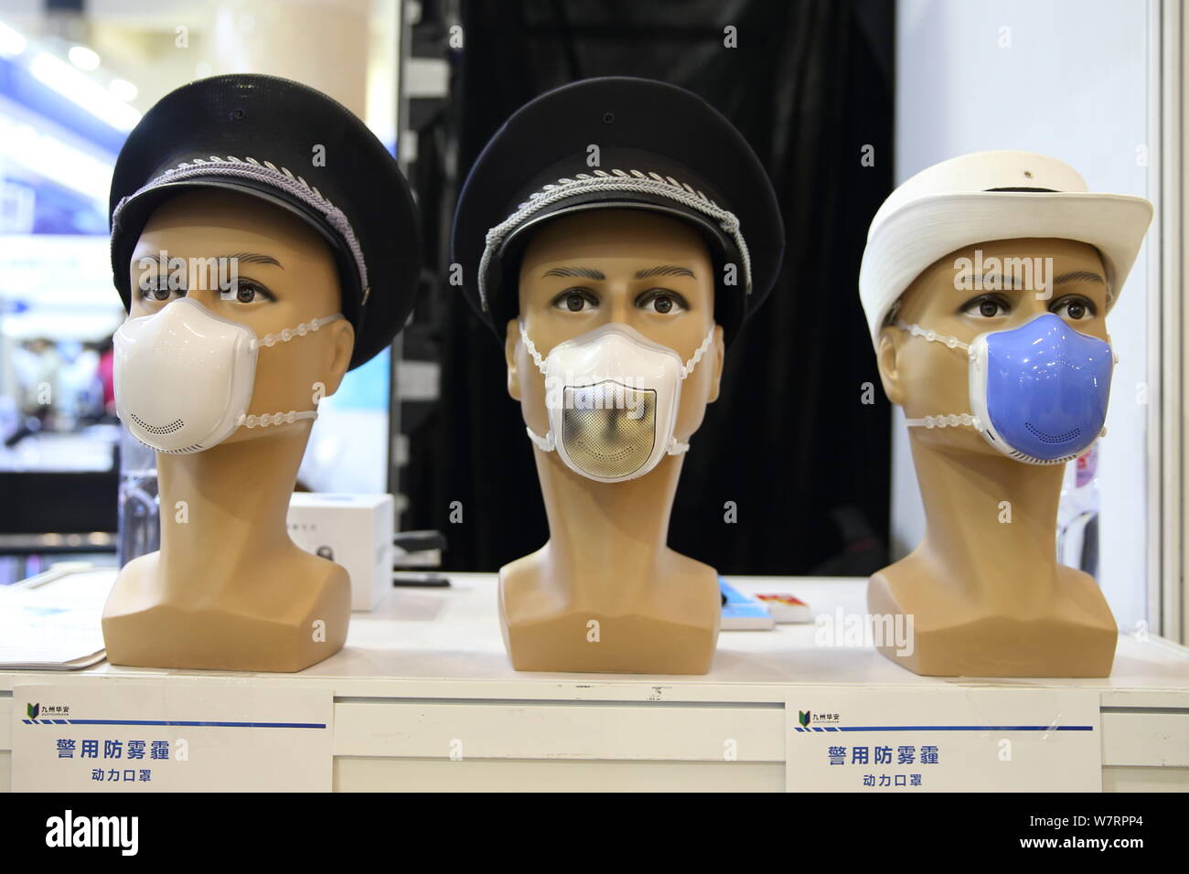 Police anti-smog face masks are on display during the 6th China ...