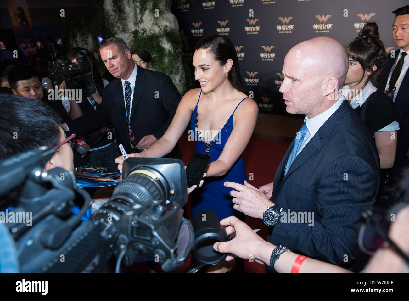 Israeli actress and model Gal Gadot signs autographs for fans as she ...