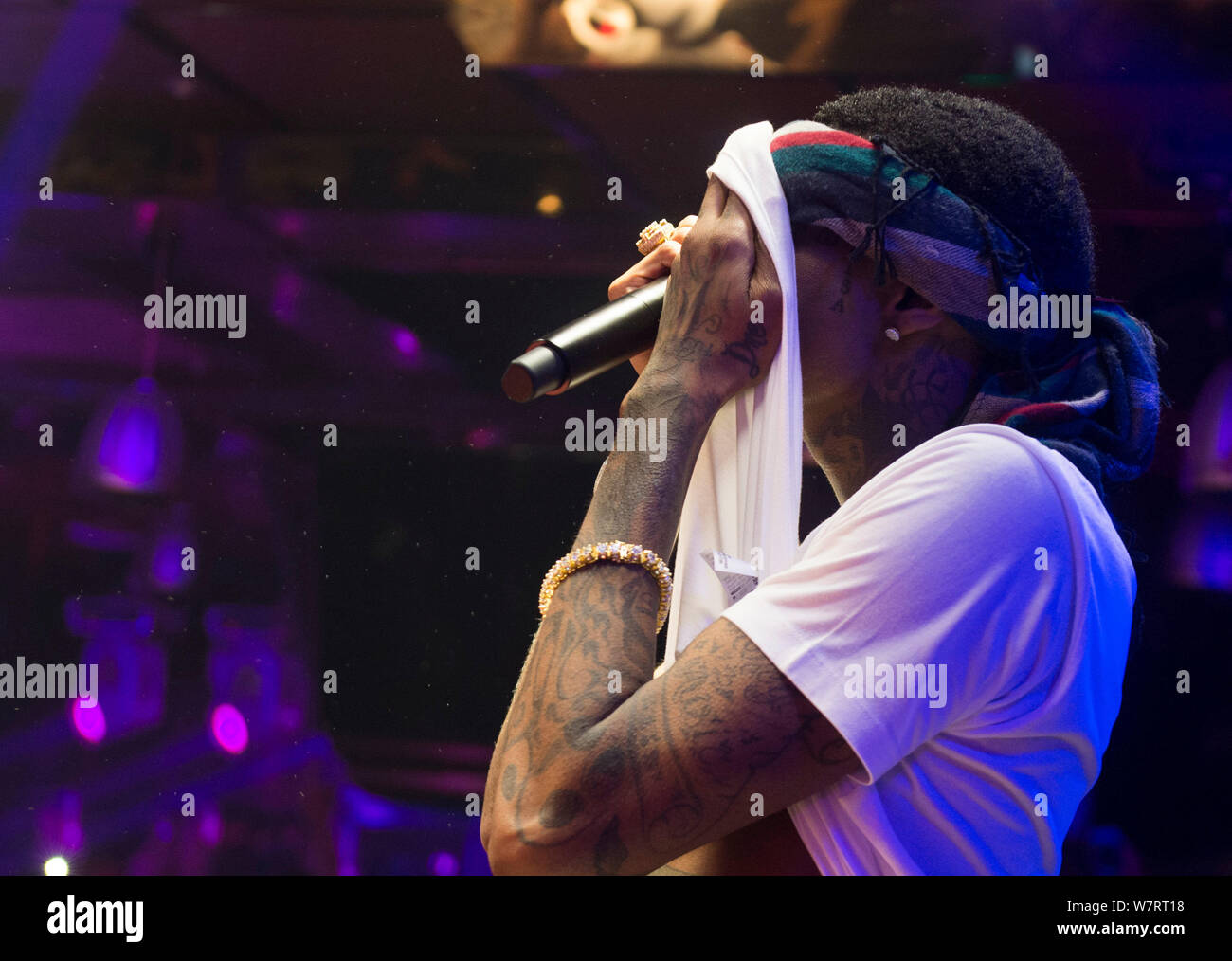 American rapper Soulja Boy performs in front of a crowd of fans at a ...