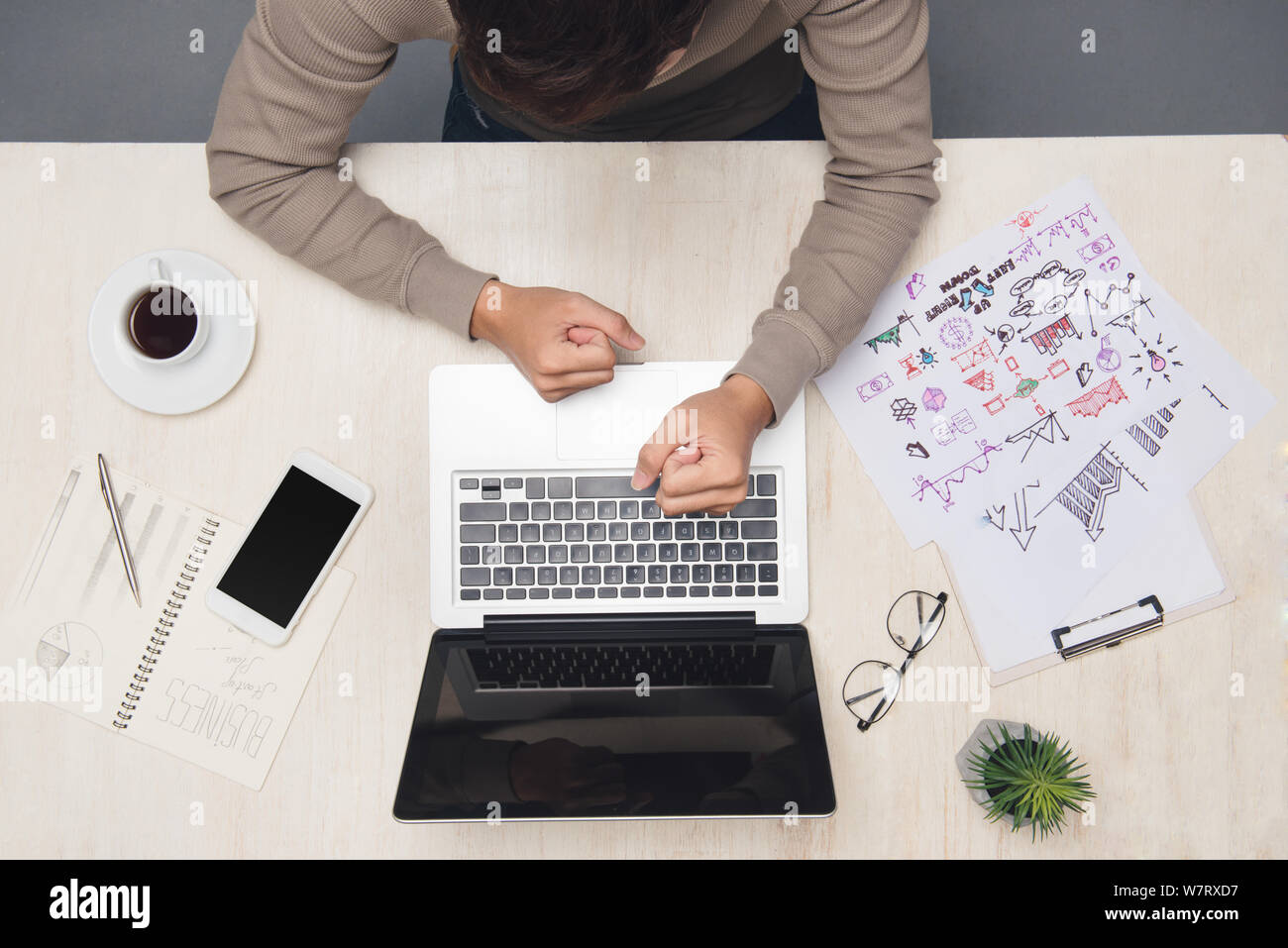 Business man is confusing or angry at his office table. Top view Stock ...
