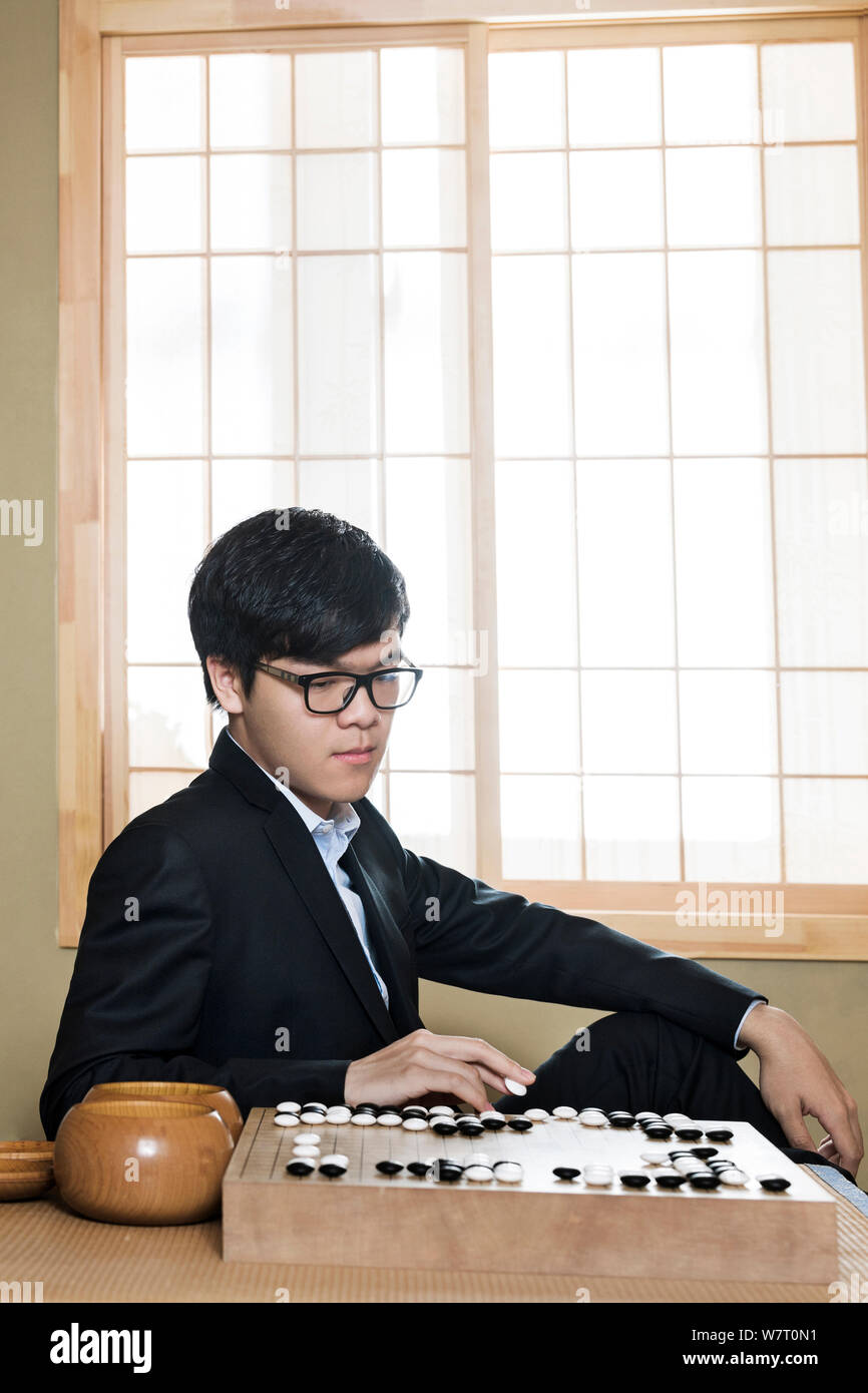 --FILE--Chinese Go player Ke Jie poses during an interview in Beijing ...