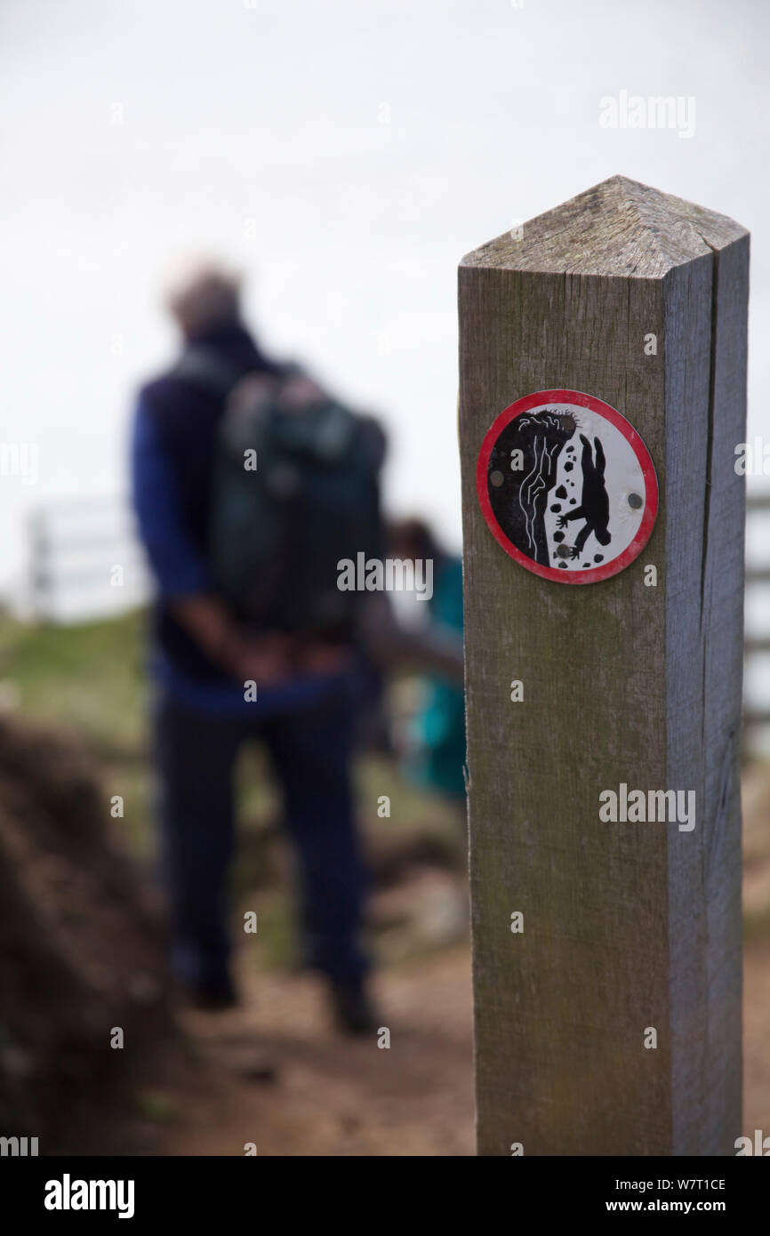 Sign warning danger of falling off cliffs on Pembrokeshire coast ...