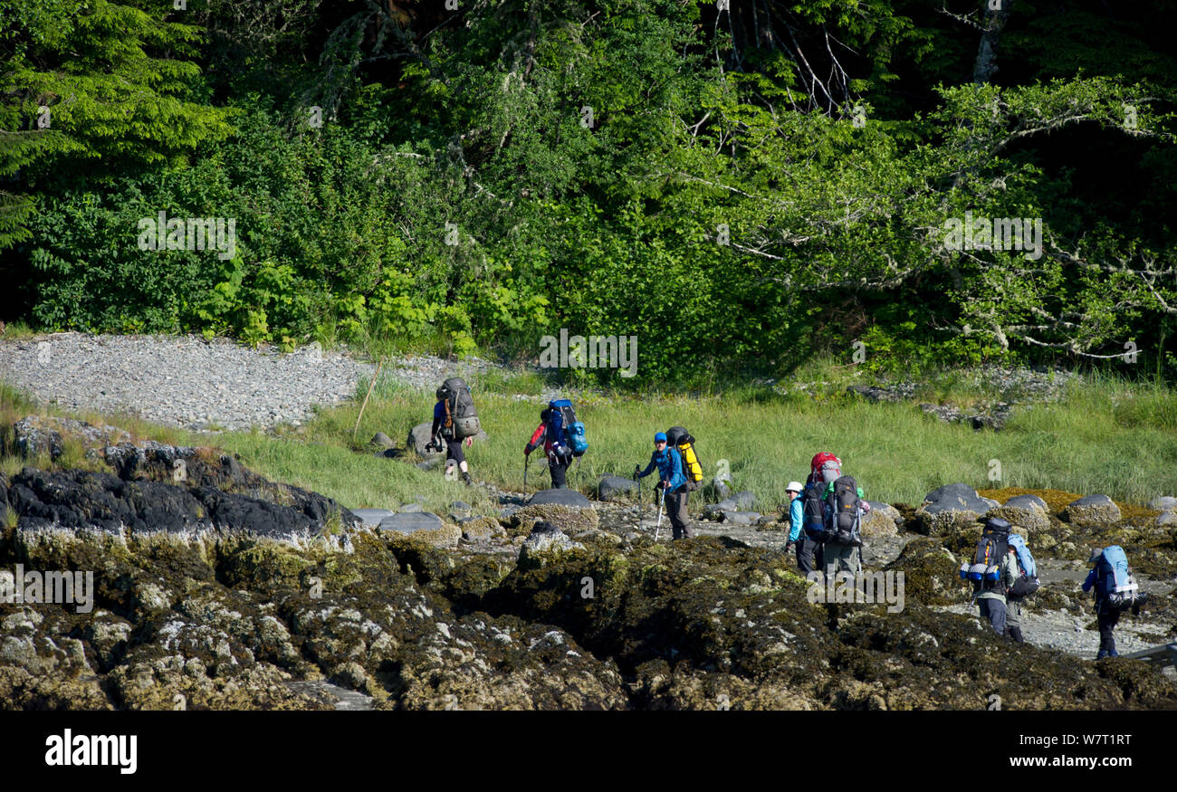 Hikers on the start of the West Coast Trail at the mouth of the Gordon ...