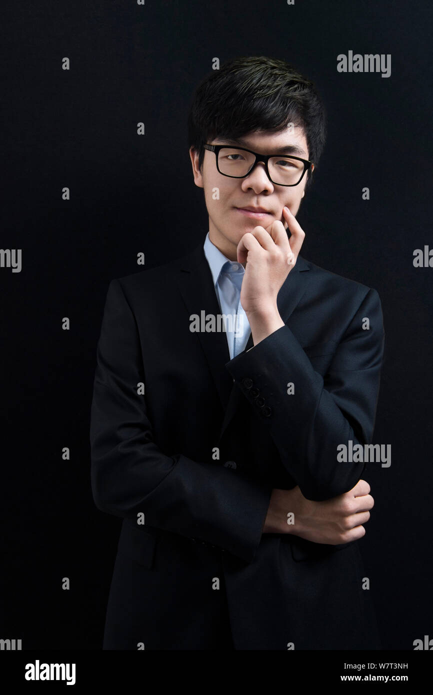 --FILE--Chinese Go player Ke Jie poses during an interview in Beijing ...