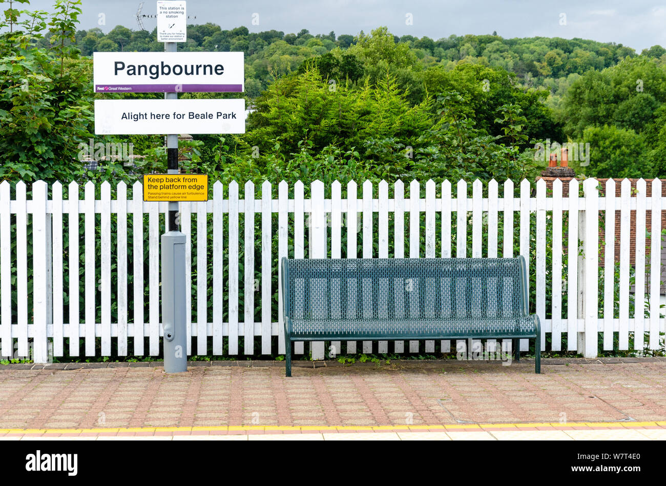 A metal bench on the platform at Pangbourne Railway Station in West ...