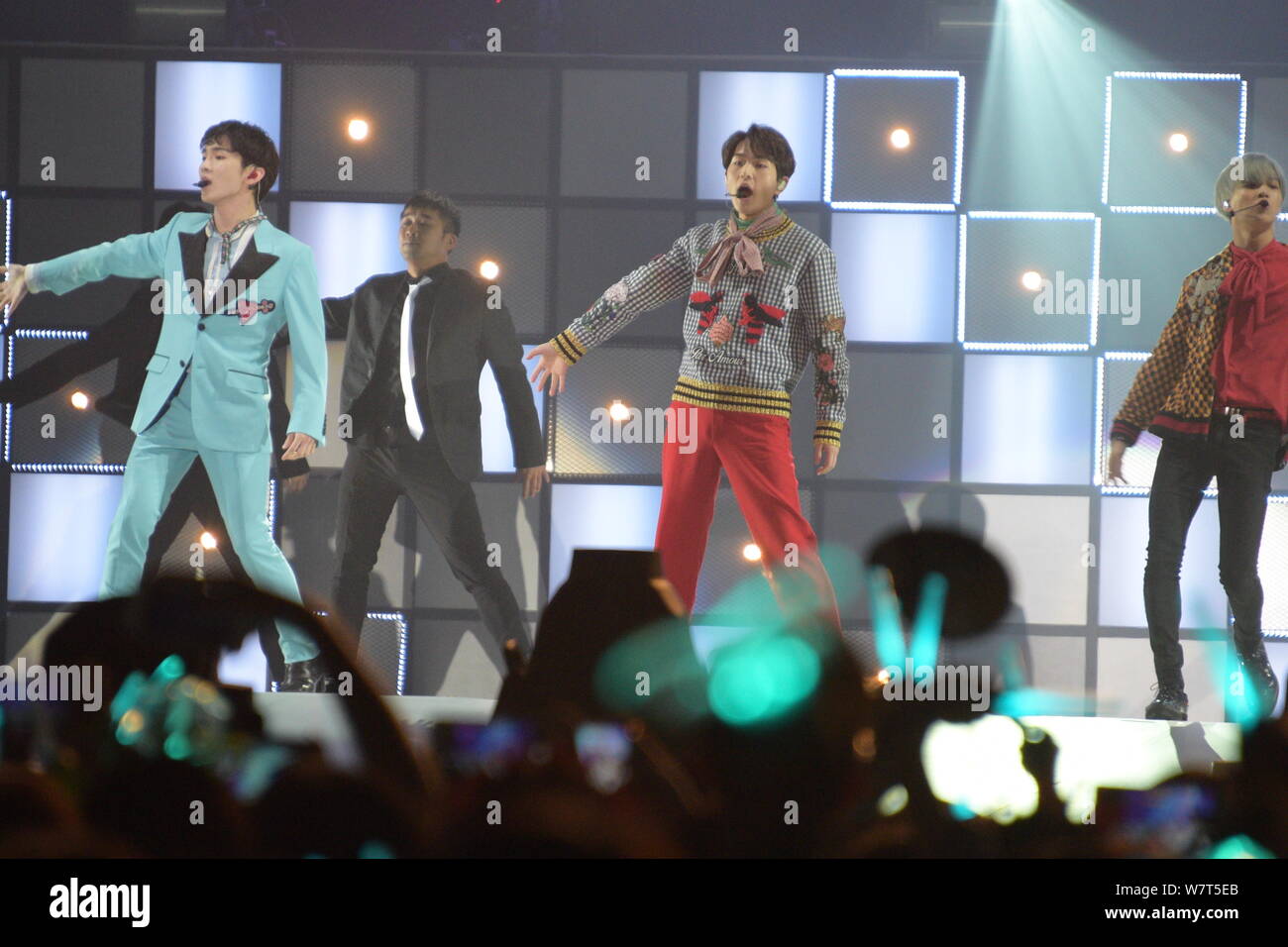 Members of South Korean boy group SHINee perform at their concert in ...