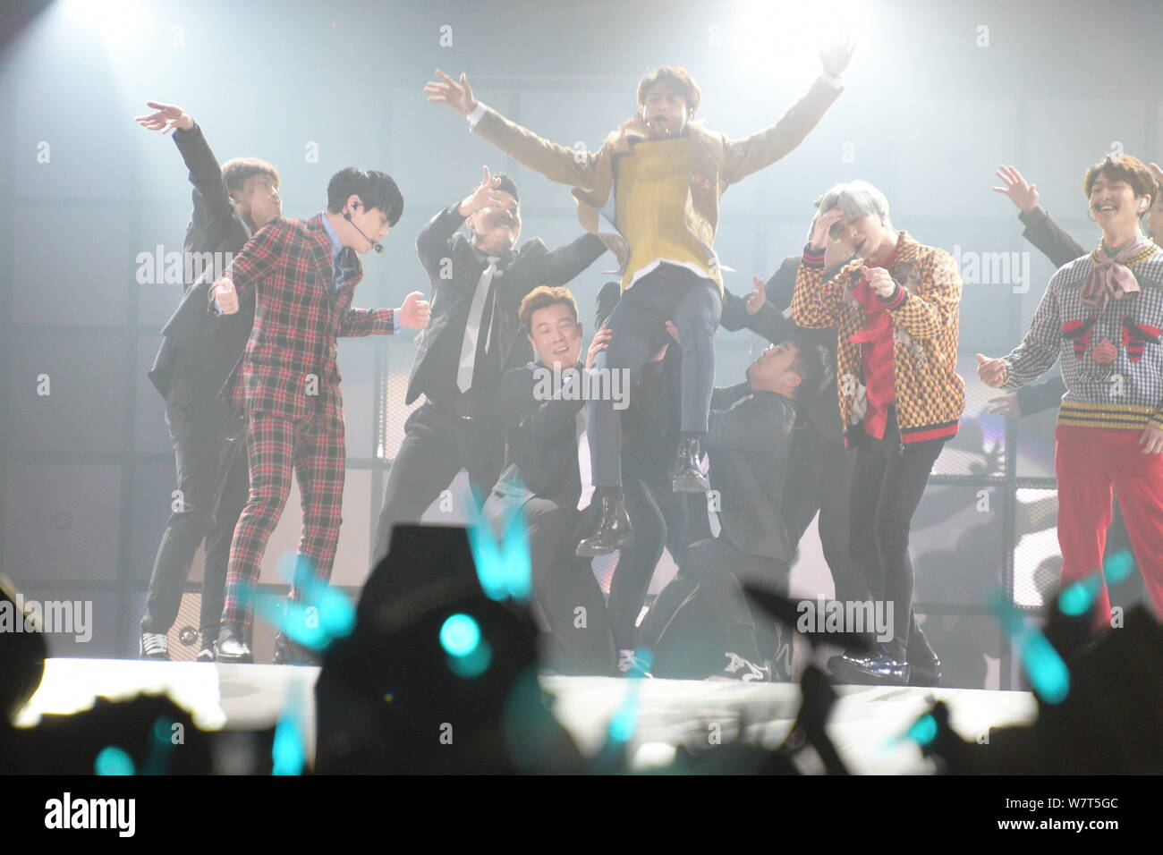 Members of South Korean boy group SHINee perform at their concert in ...
