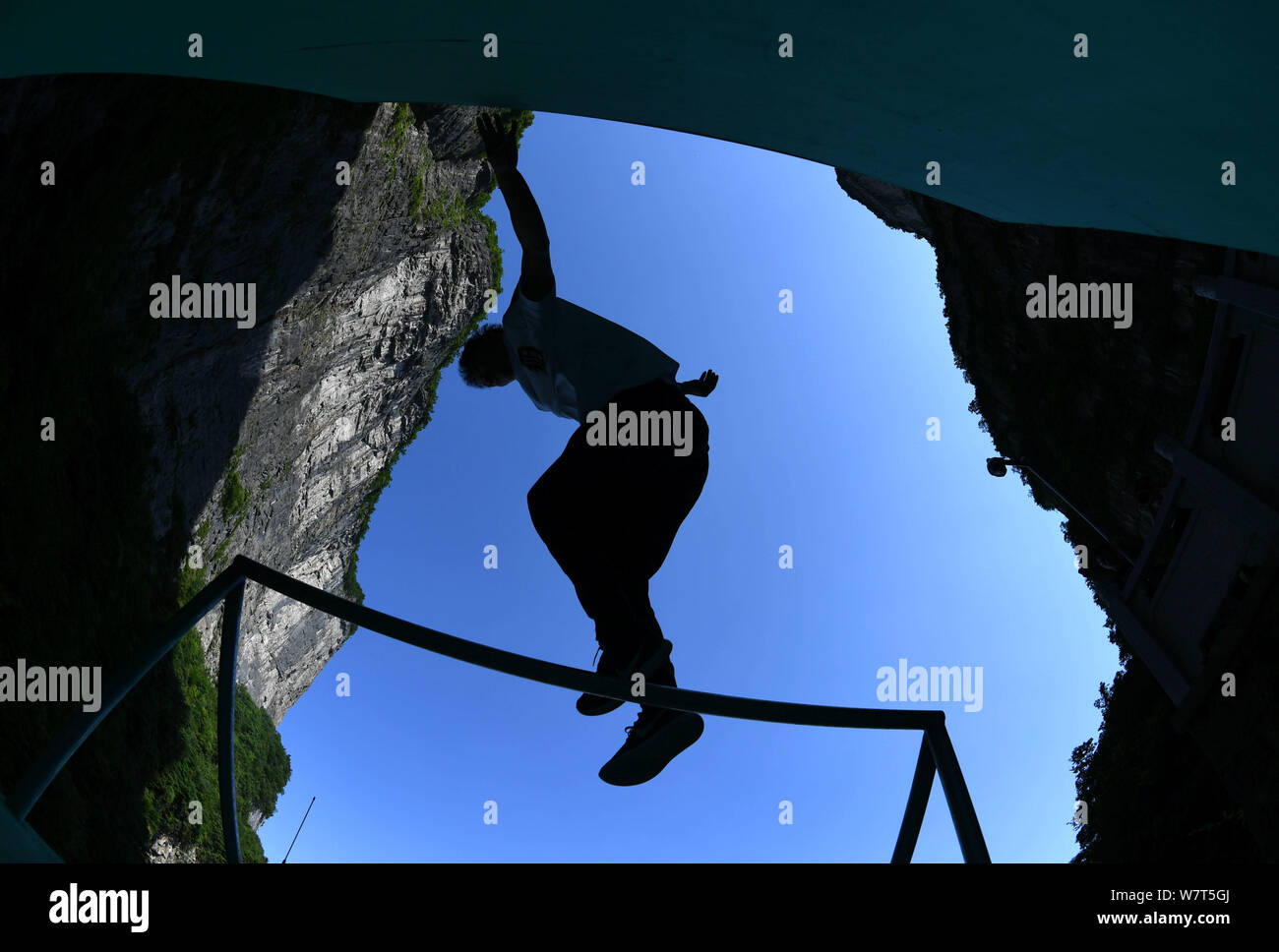 A free running athlete shows his parkour skills during the Skyladder ...