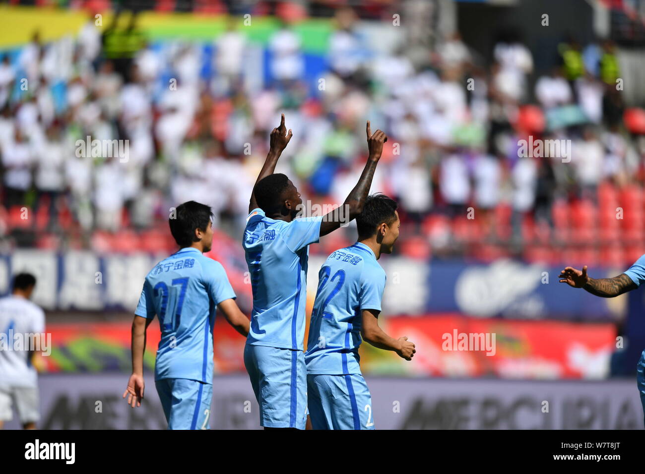 Brazilian football player Ramires, center, of Jiangsu Suning ...