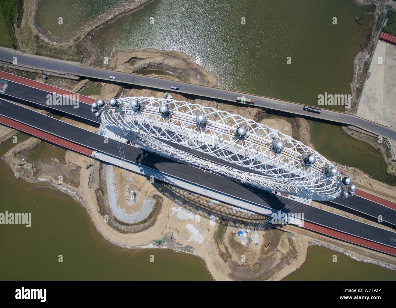 Aerial view of Bailang River Bridge Ferris Wheel, the world's first ...