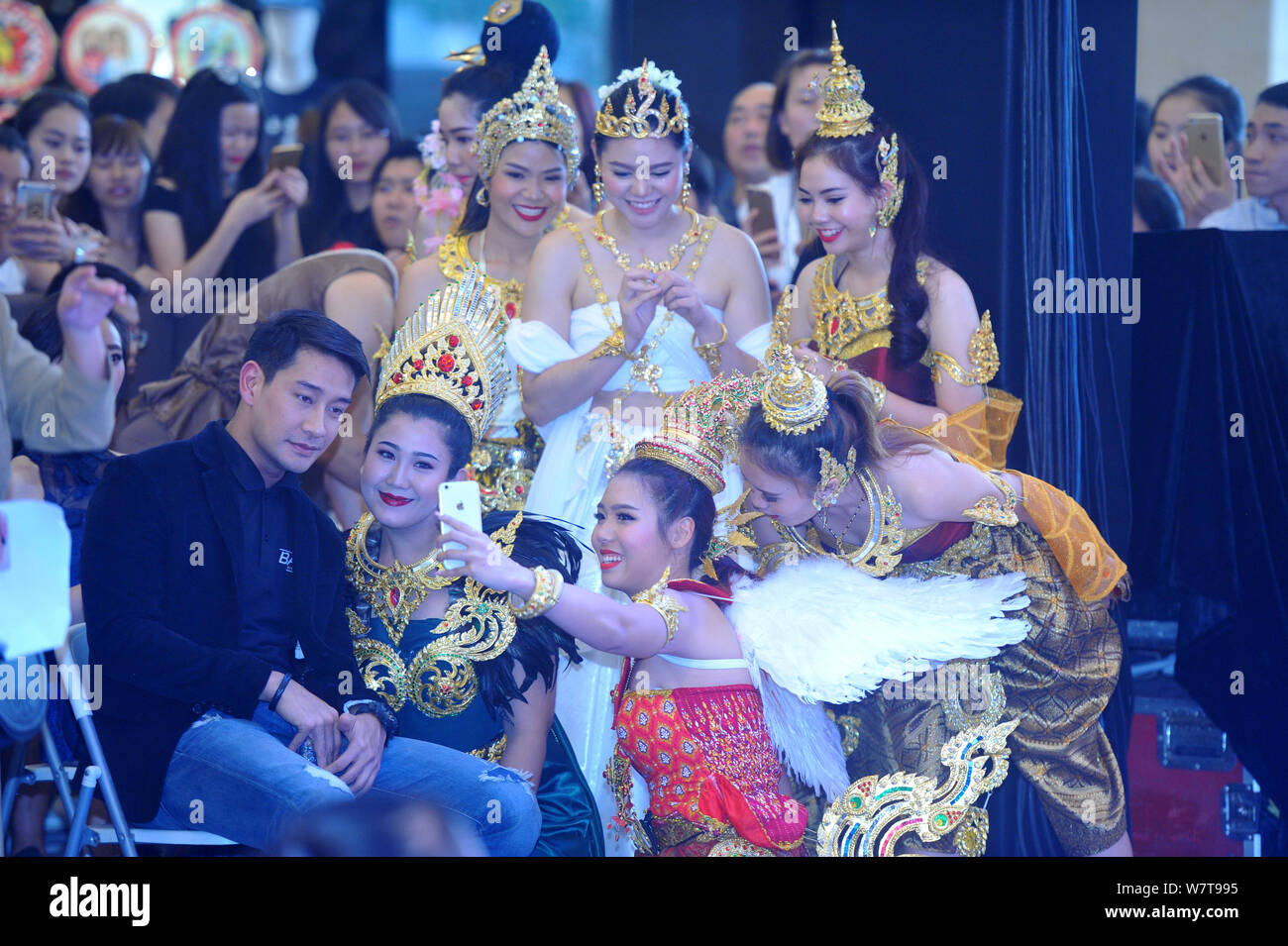 Thai actor Nawat Kulrattanarak, front left, better known by his stage ...