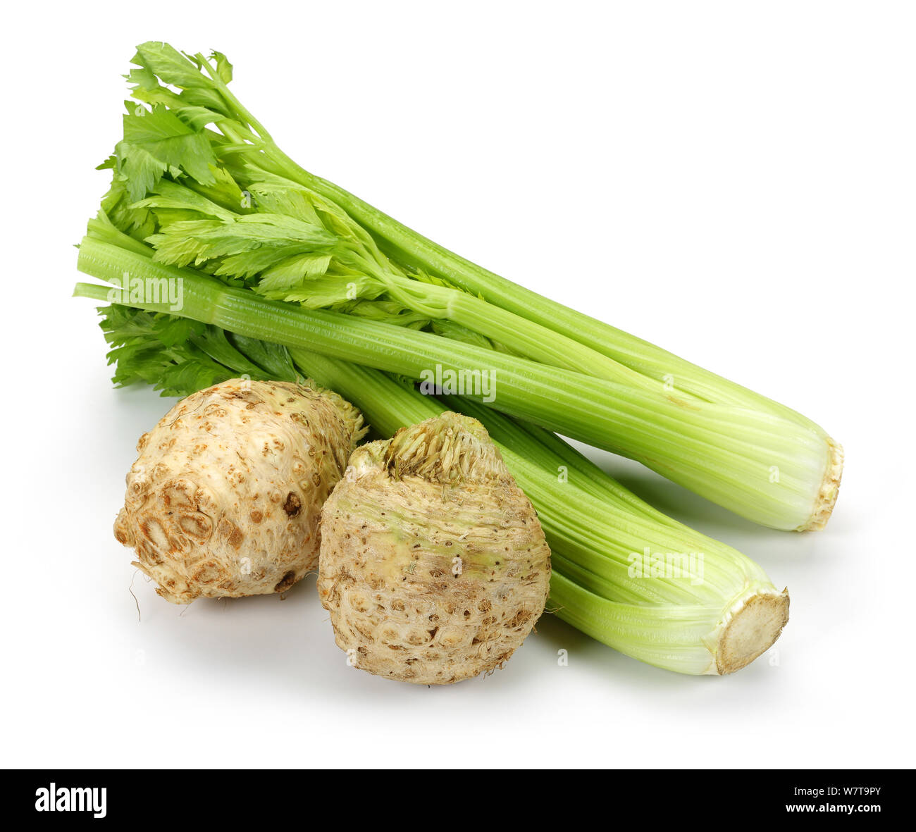 Fresh celeriac root with celery stalks isolated Stock Photo - Alamy