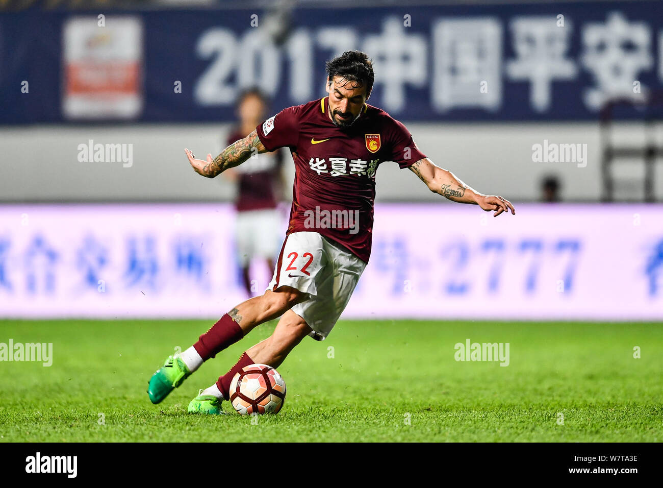 Argentine football player Ezequiel Lavezzi of Hebei China Fortune kicks ...