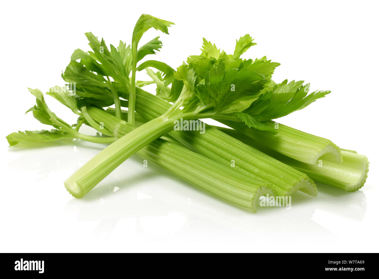 Fresh celery stalks and leaves isolated on white background Stock Photo ...