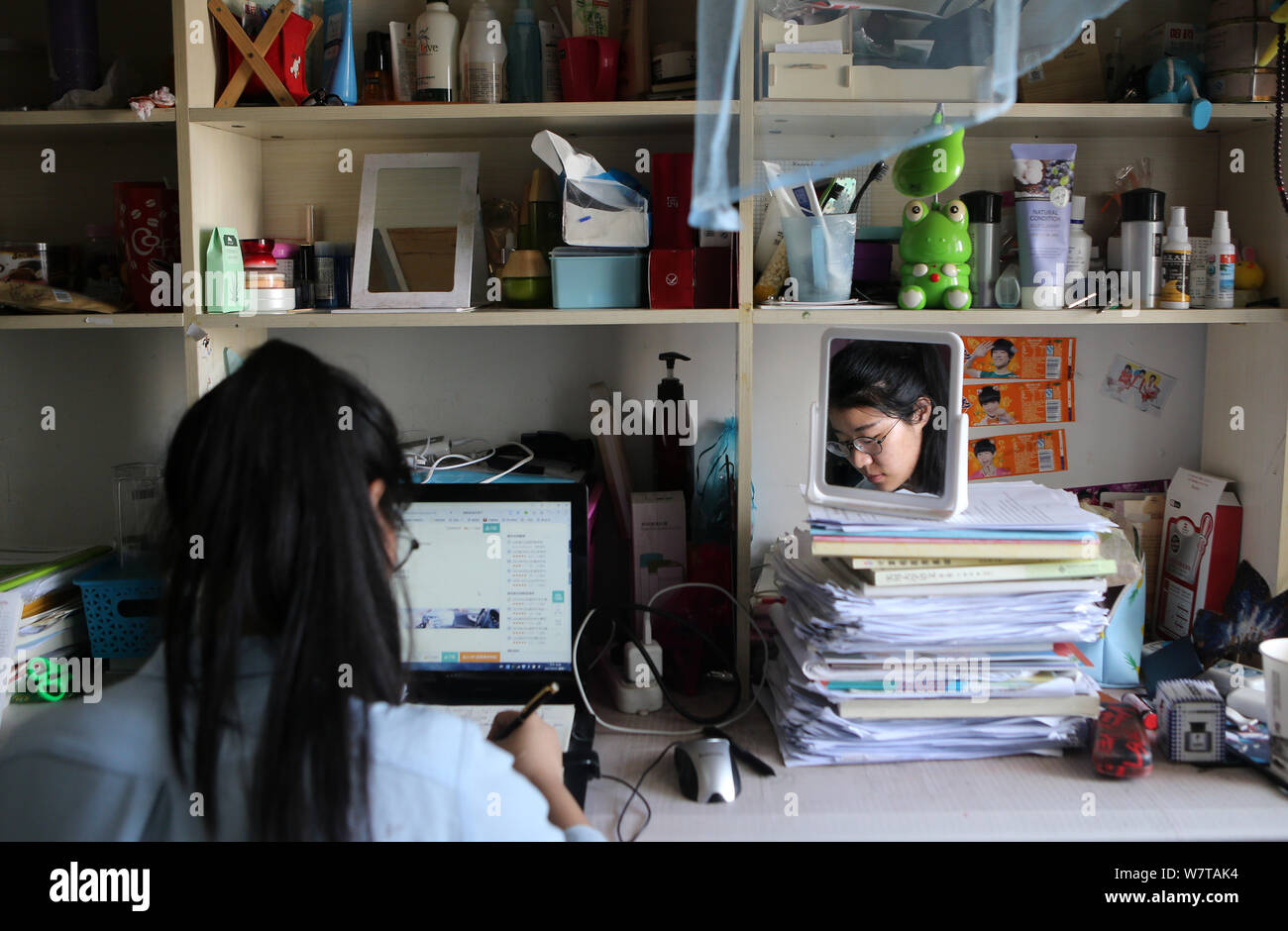 21-year-old Chinese student Tang Lisha, who comes from a poor family in ...