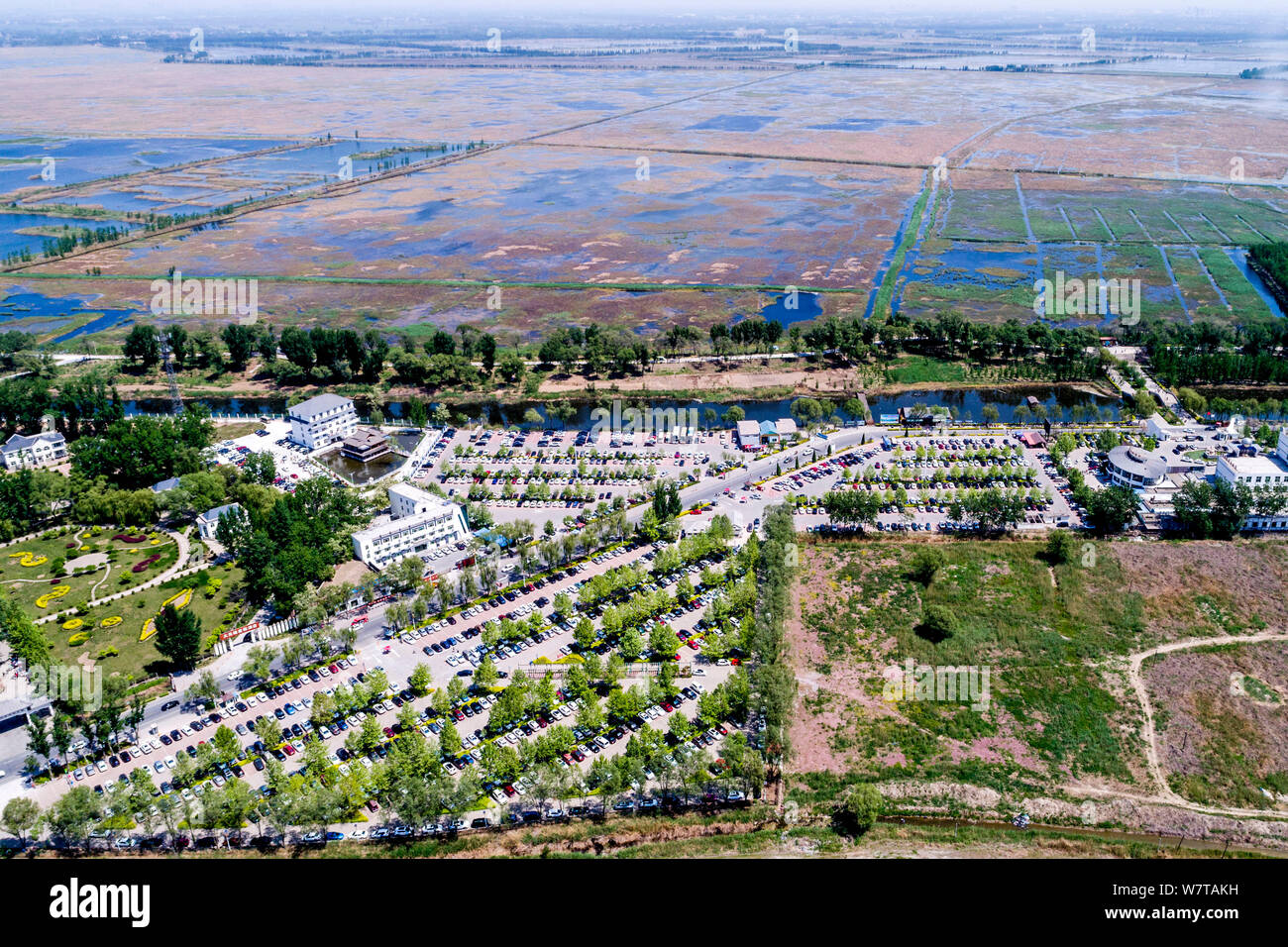 Aerial view of vehicles in the parking lot of the Baiyangdian Lake ...
