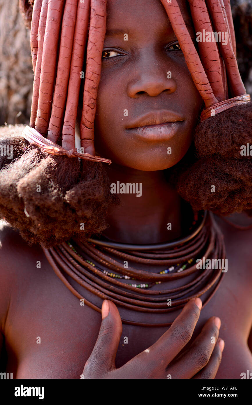 Portrait of Himba woman with characteristic Otjize (a mix of butter ash ...
