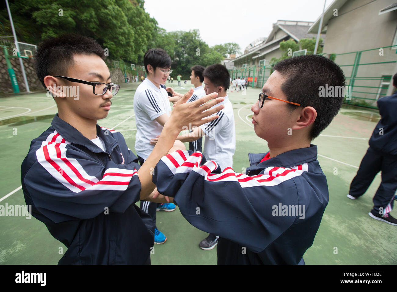 Chinese students at the high school attached to Zhejiang University are ...